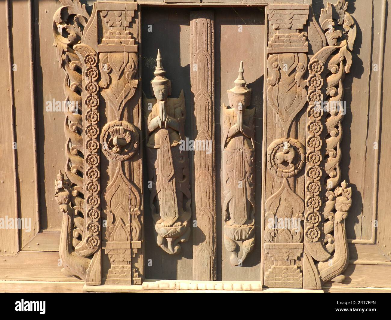Myanmar, Mandalay: details of some fine wood carving in the Shwe In Bin ...