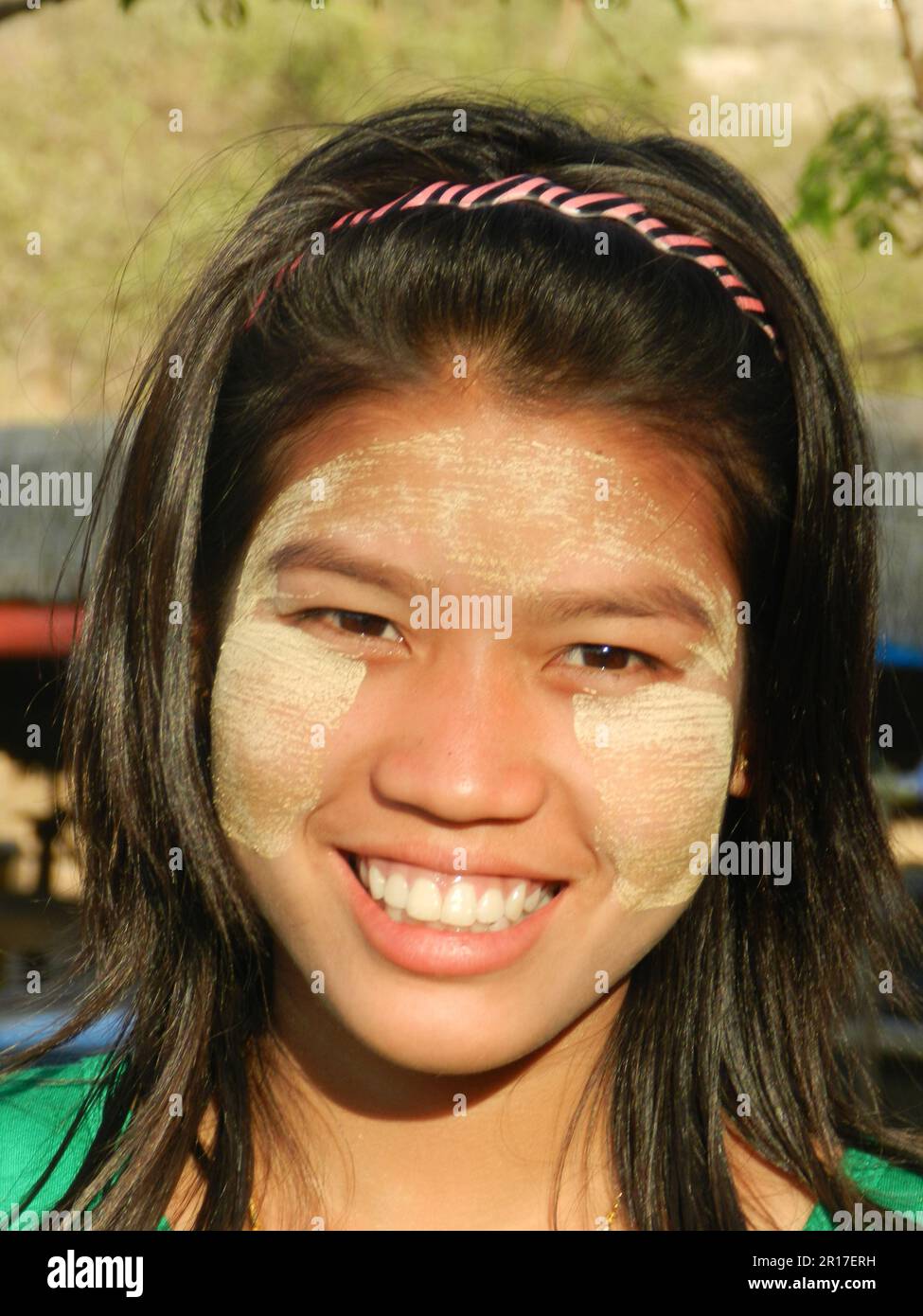 Myanmar, Bagan: young Burmese girl wearing the traditional "thanakha ...