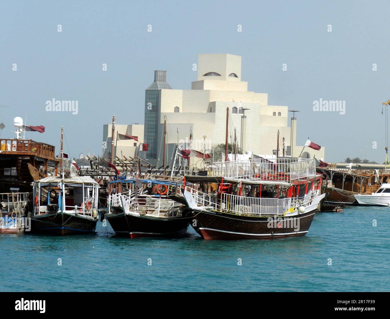 Qatar, Doha: Dhow Harbour with the Museum of Islamic Art behind Stock ...