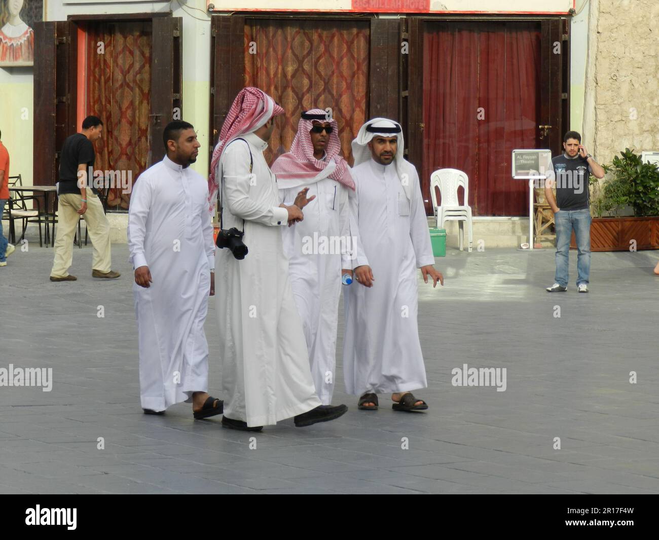 Qatar, Doha: many arabs pass the time of day in Waqif Soukh Stock Photo ...