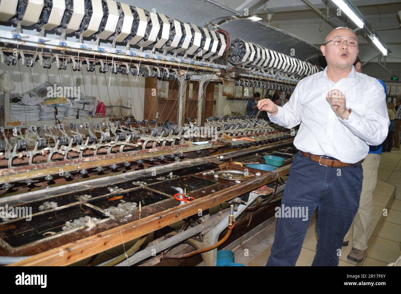 People's Republic of China, Shanghai: retrieving silk thread from ...