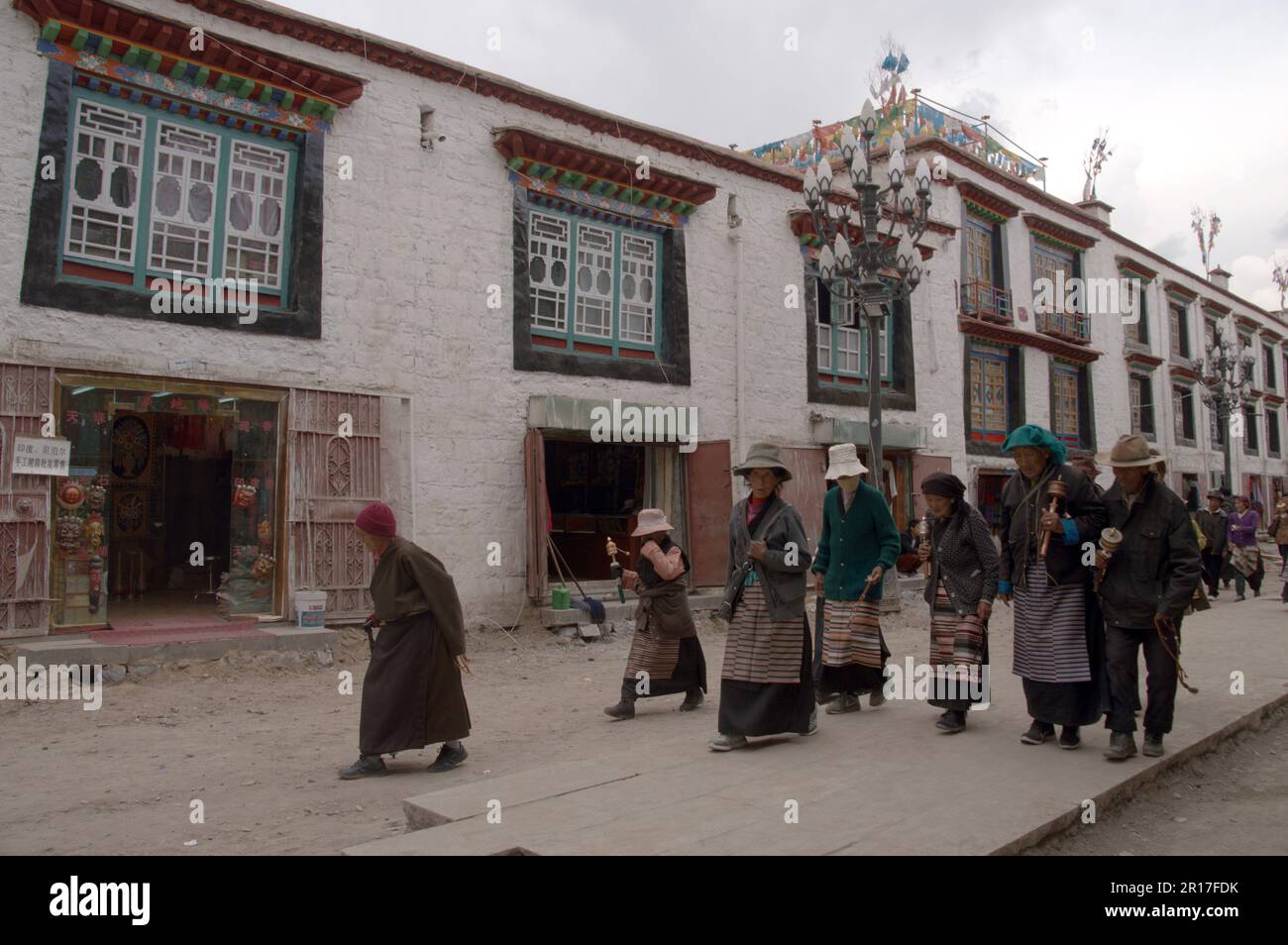 People's Republic of China, Tibet, Lhasa: pilgrims walking round the ...