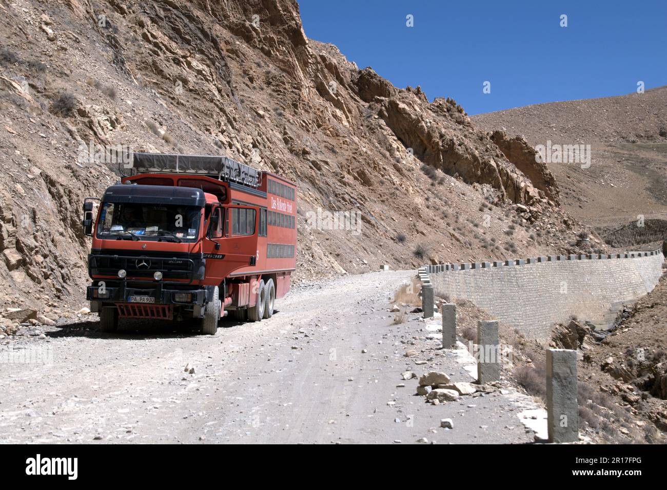 People's Republic of China, Tibet: Rotel bus waiting to enter tunnel ...