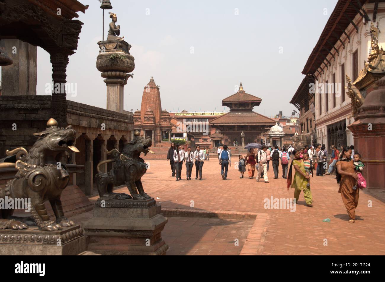 Nepal, Bhaktapur: Durbar Square, with bronze lions defending Chayasilin ...