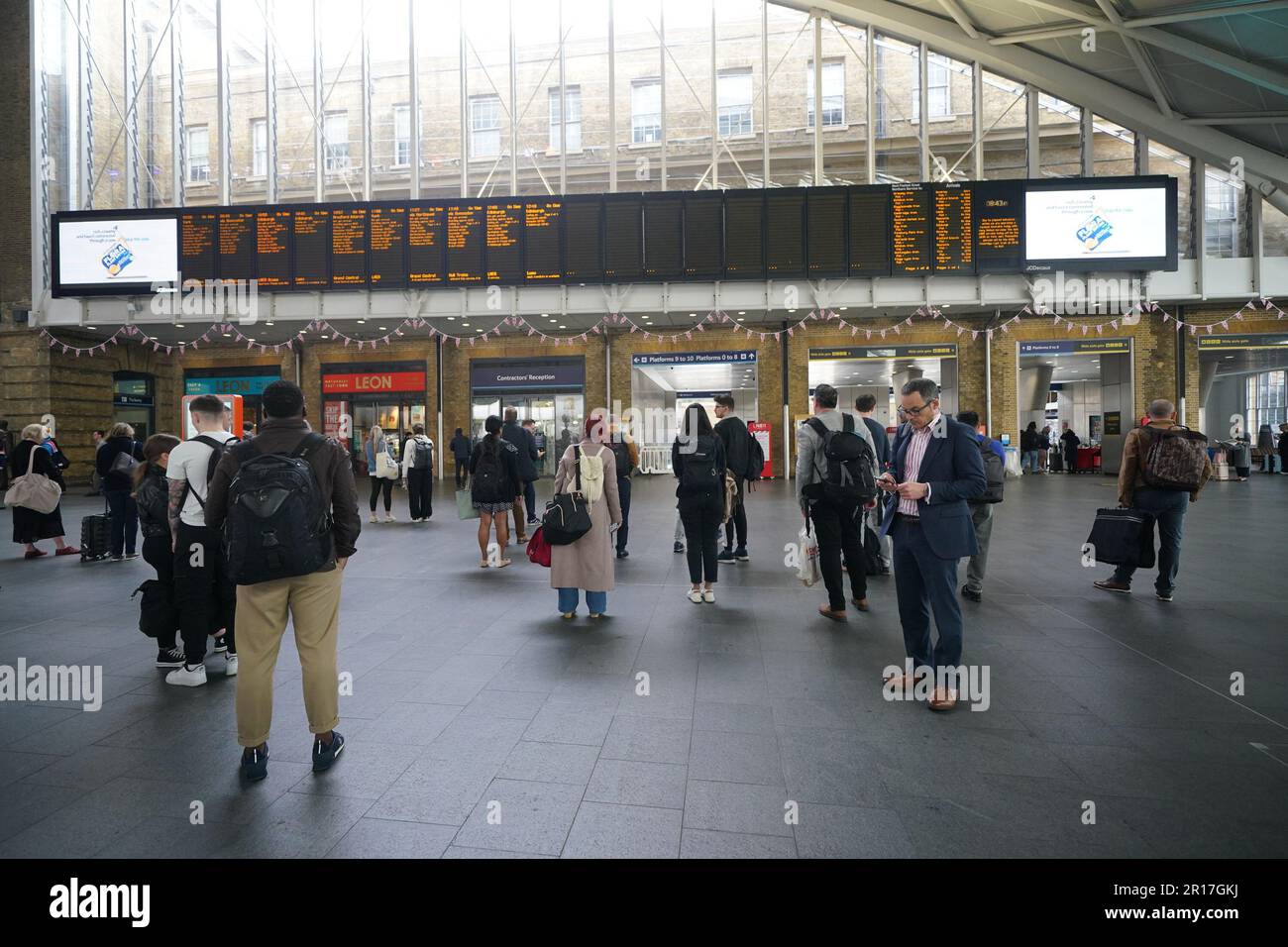 Travellers at King's Cross station as members of the drivers' union ...