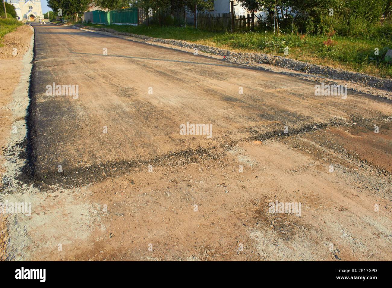 new asphalt is laid in the village Stock Photo - Alamy