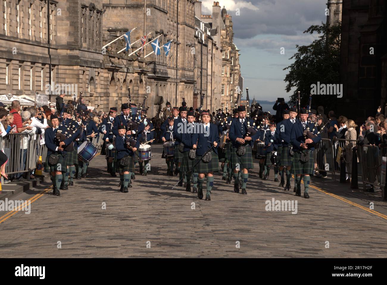 Scotland, Edinburgh: pipe band passing the City Chambers on the Royal ...