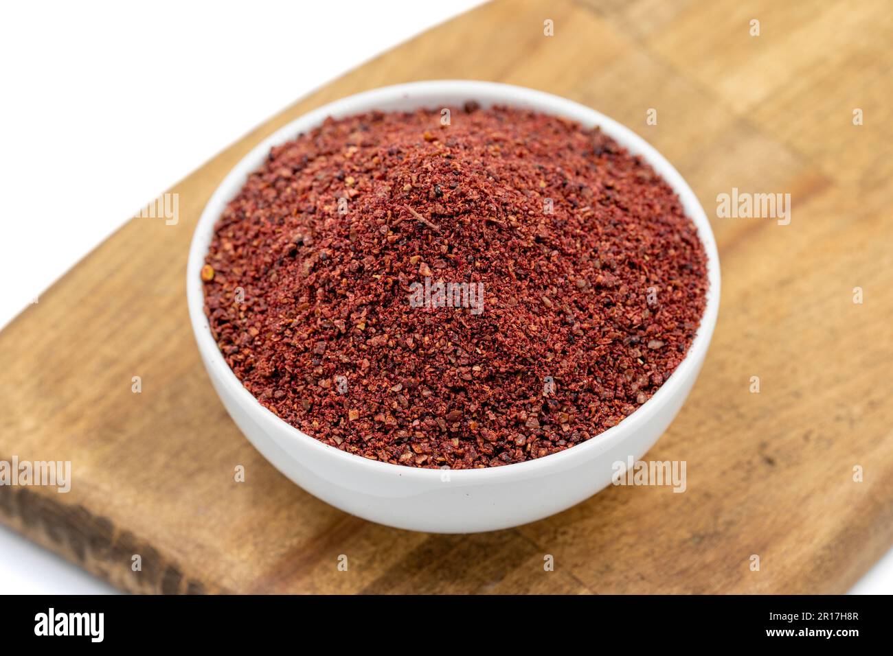 Sumac isolated on white background. Dried ground red Sumac powder ...