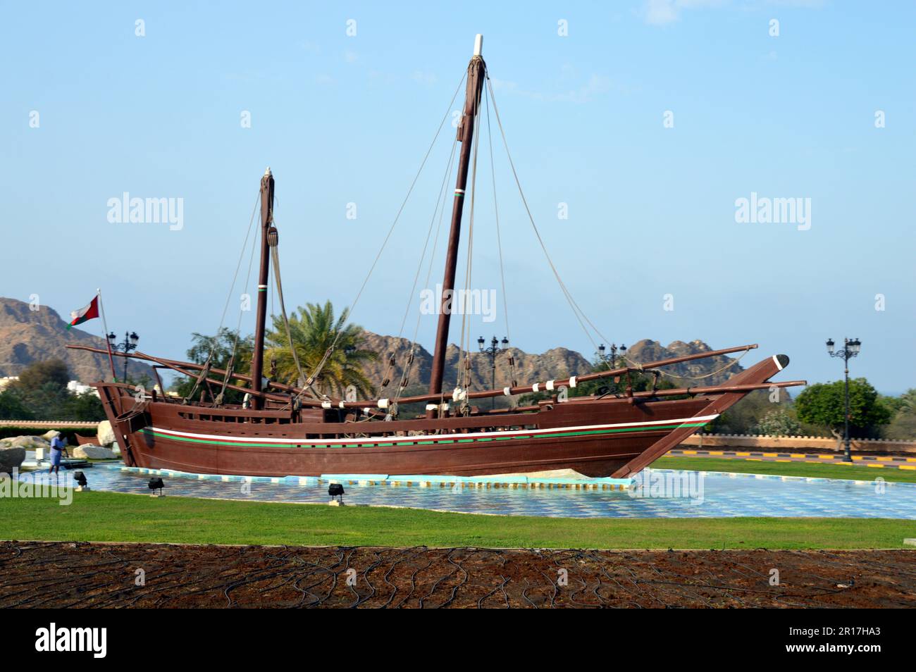 Oman, Muscat: a traditional dhow is a feature on one of the traffic ...