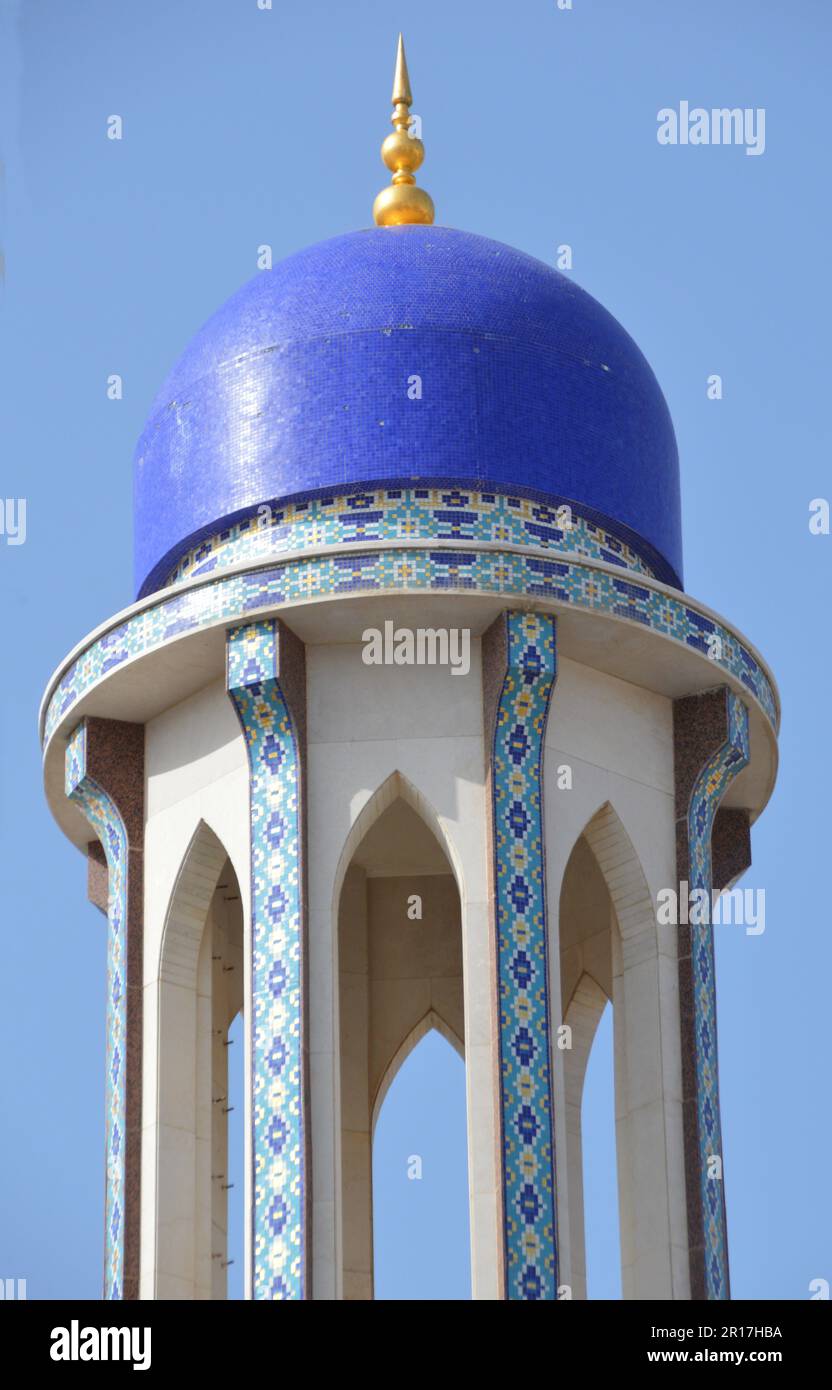 Oman, Muscat: one of the colourful "minarets" of the Al Khor Mosque ...