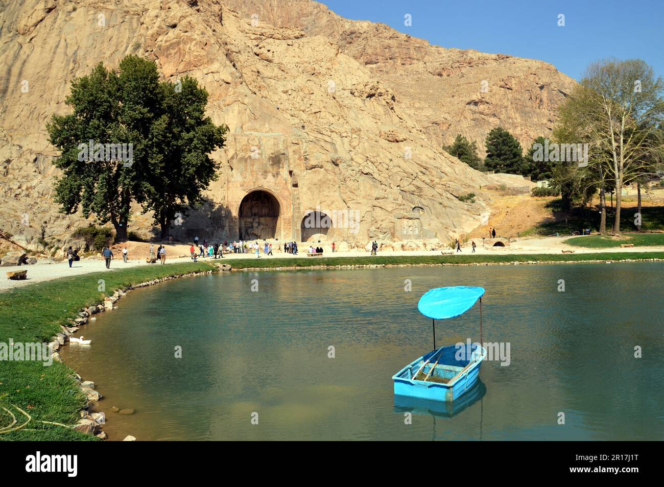 Iran, Bisotun: the towering cliffs are carved with a series of famous ...