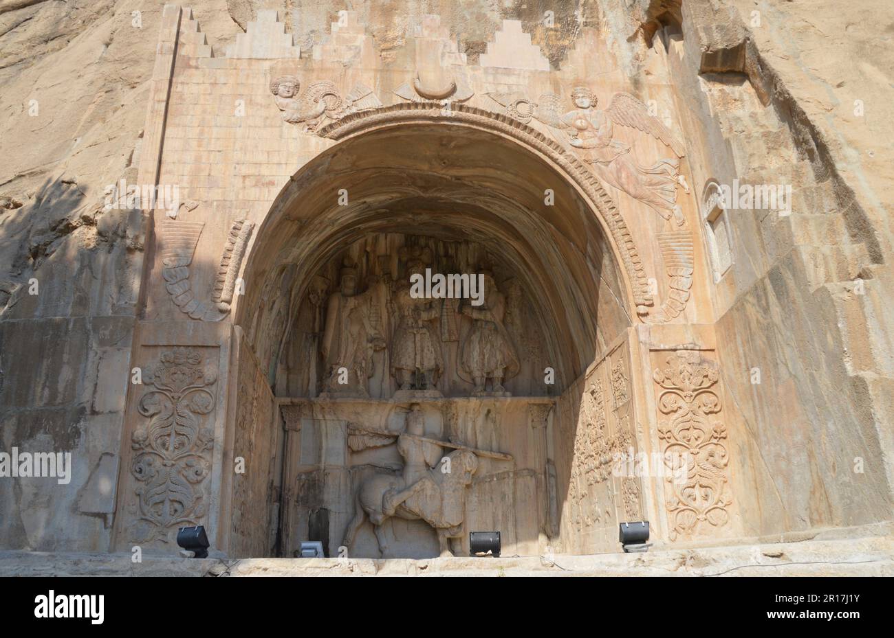 Iran, Bisotun: the towering cliffs are carved with a series of famous ...