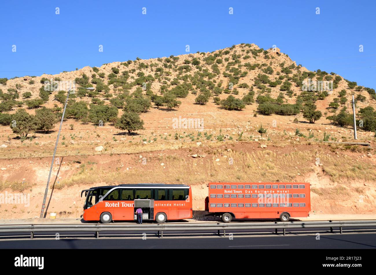 Iran, Kermanshah: Rotel Setra bus with trailer parked near the war ...