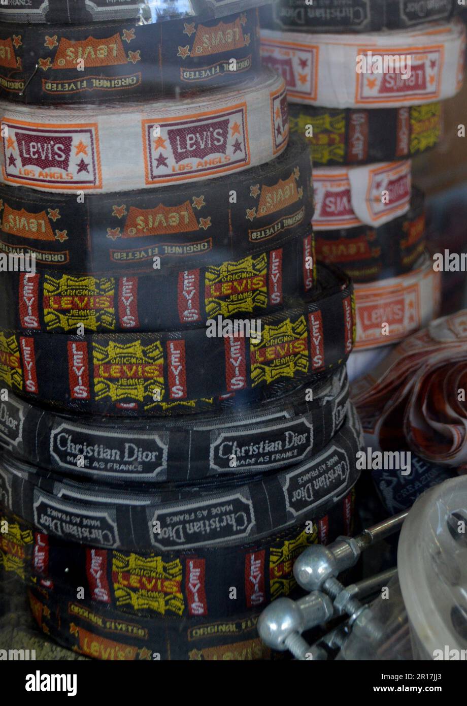 Iran, Tabriz: "Levi's" and "Christian Dior" labels available in rolls ...