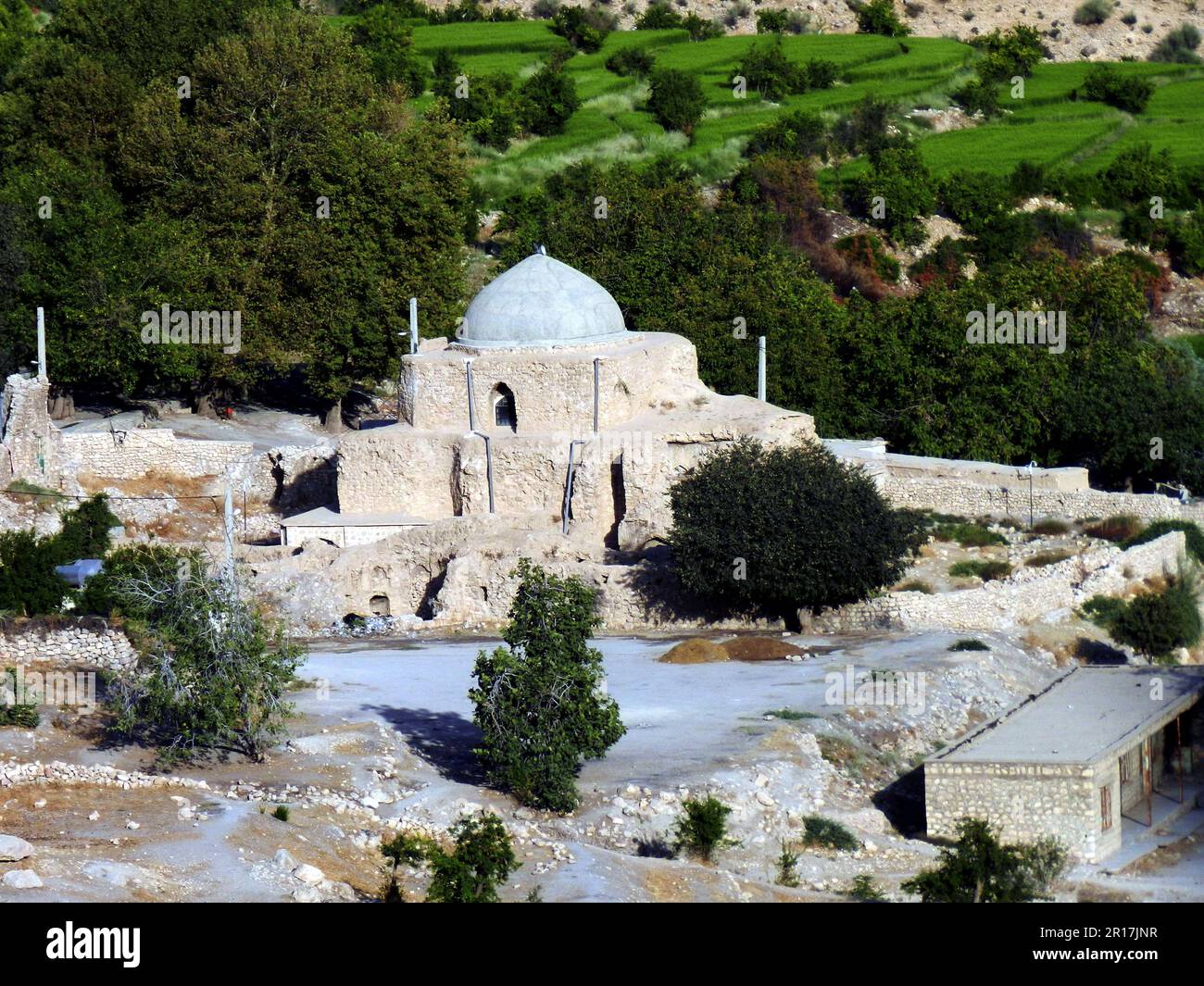 Iran: a tiny, mud-brick mosque in a fertile valley in the wild Zagros ...