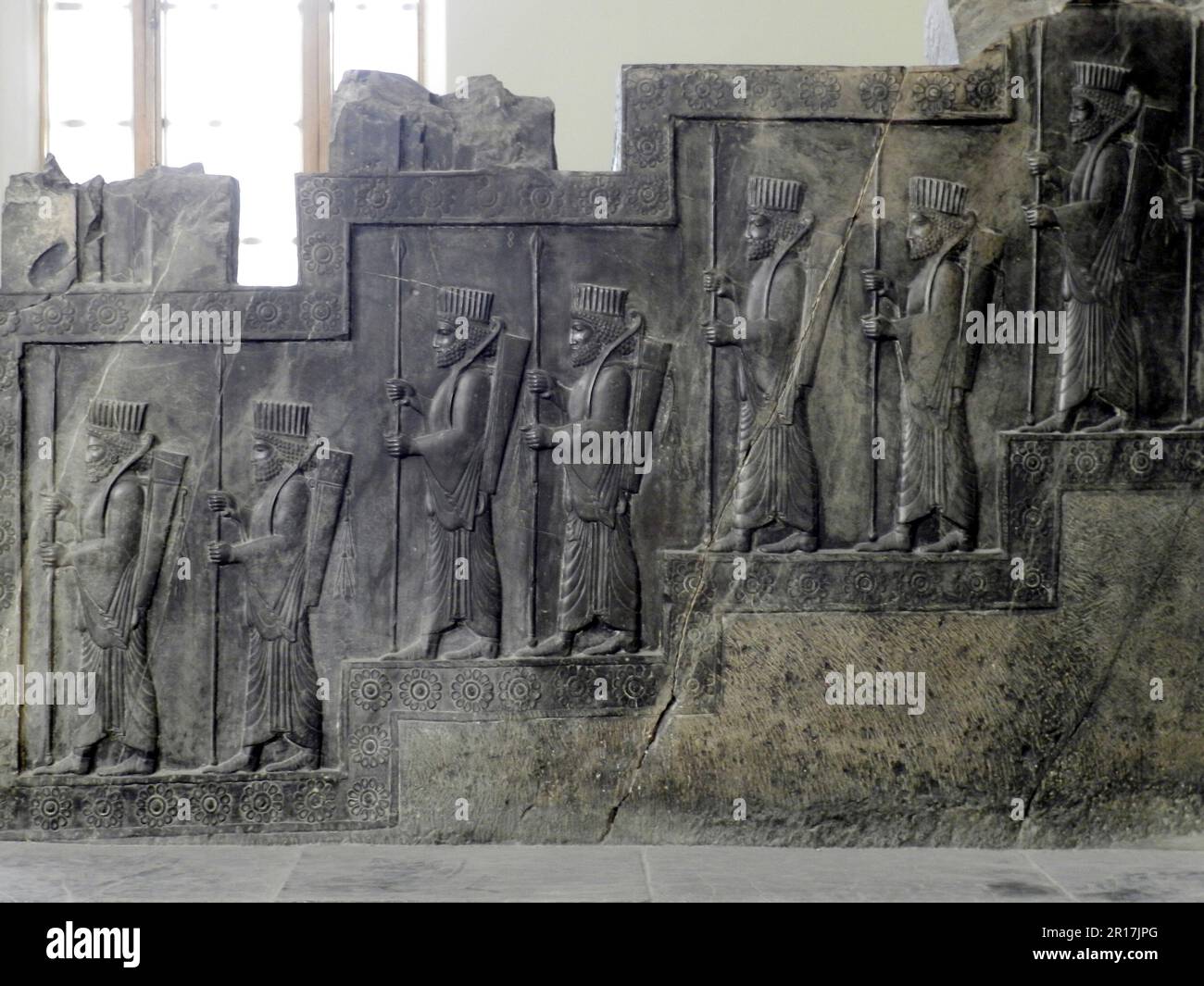 Iran, Teheran: bas-relief of Persian soldiers armed with spears and ...