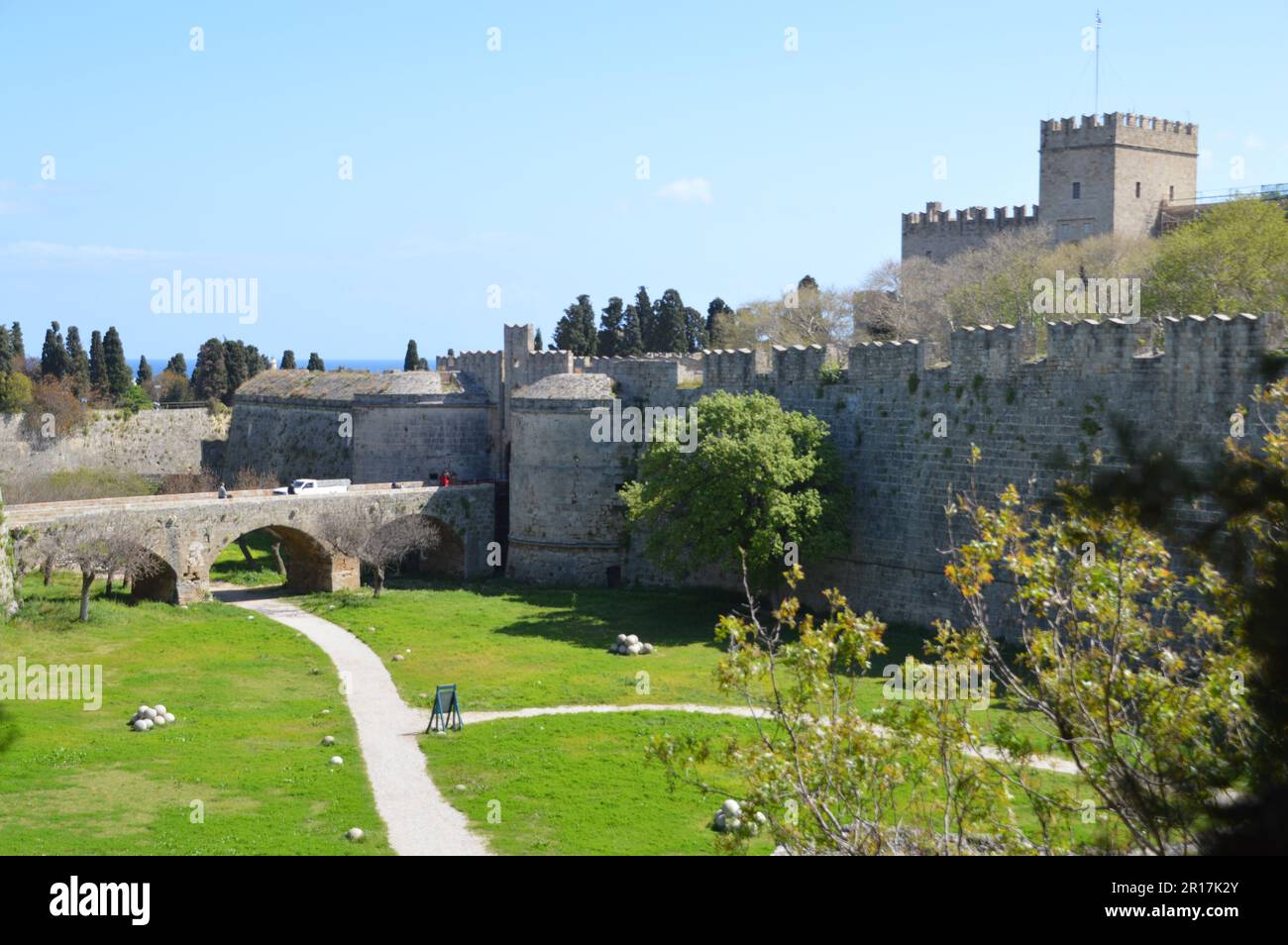 Greece, Island of Rhodes: view of the old city walls and moat with the ...