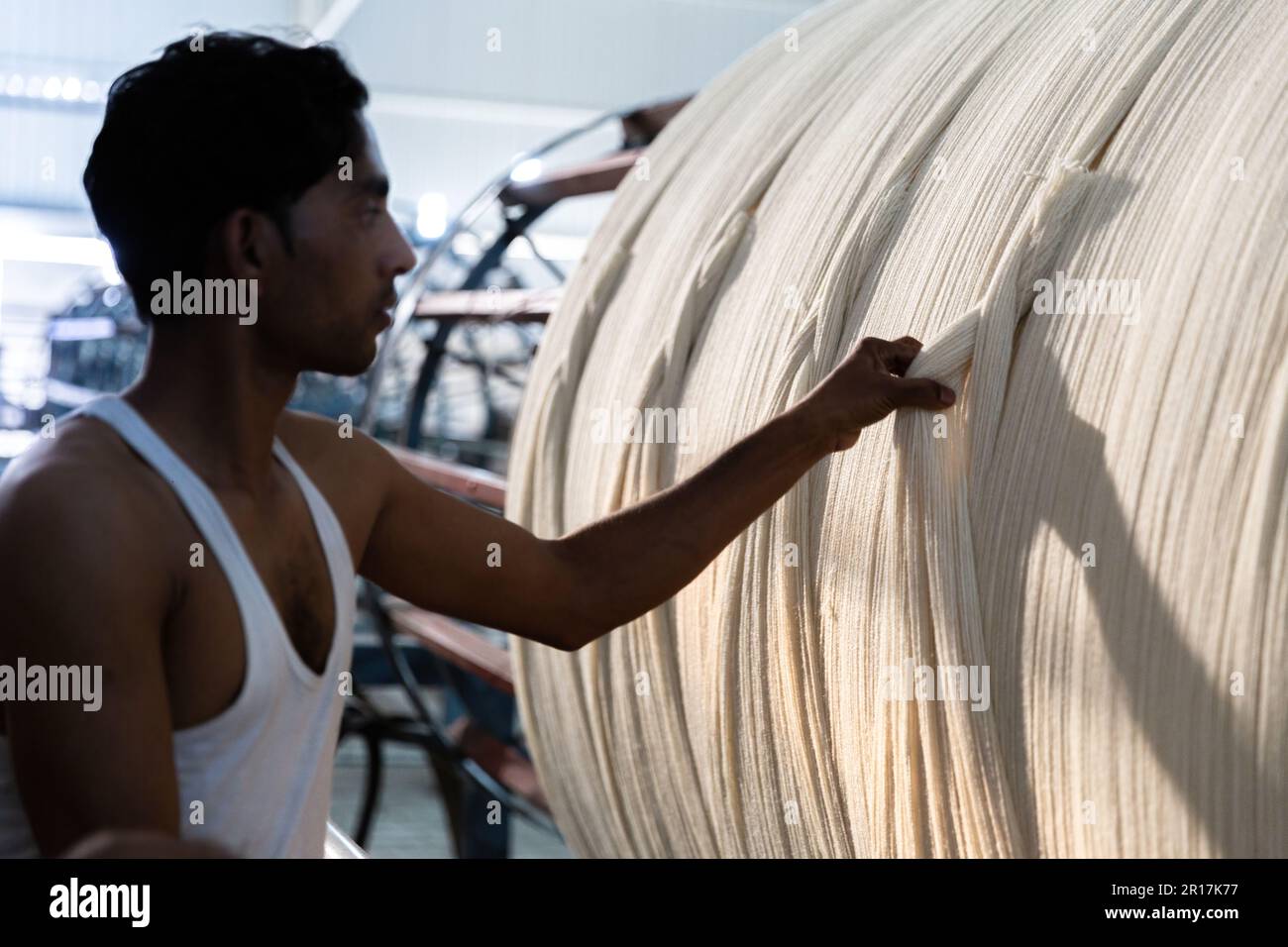 Cotton rag yarn at a Carpet Factory in India Stock Photo - Alamy