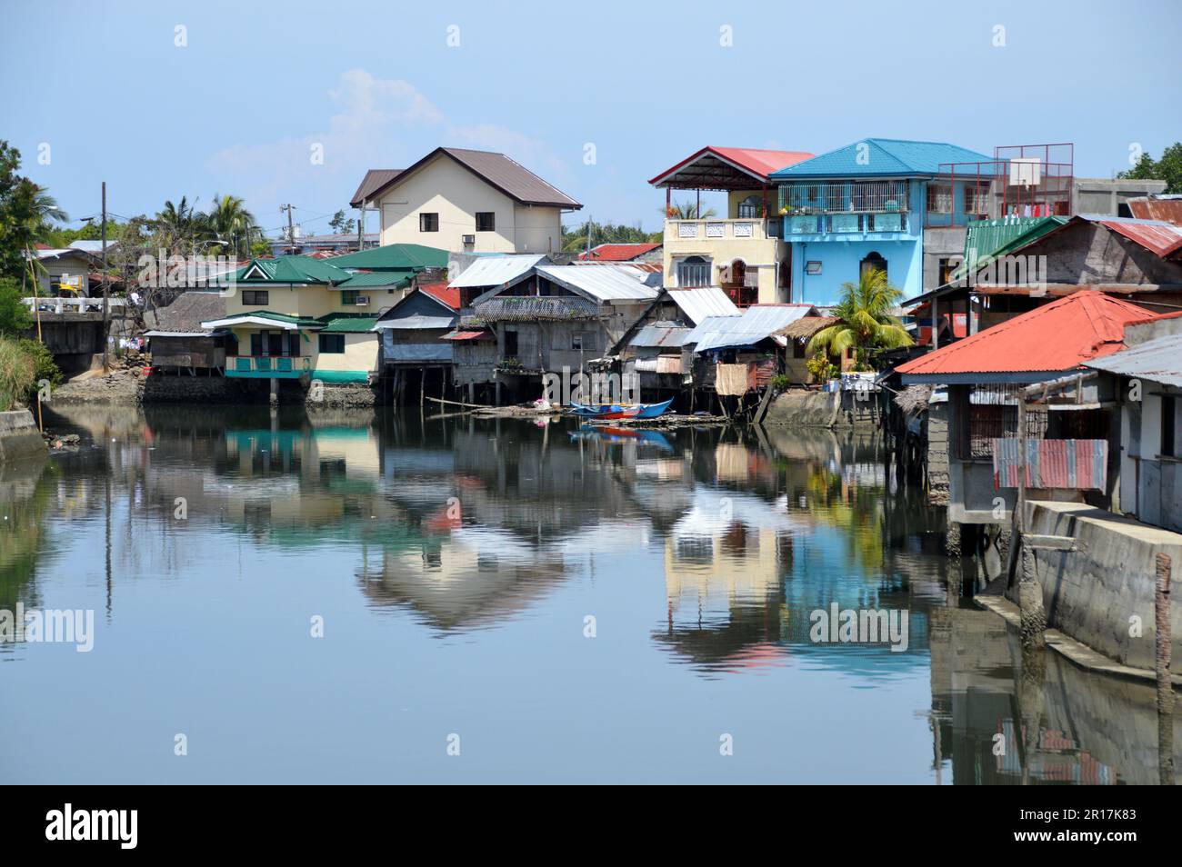 The Philippines, Samar Island, Calbayog: colourful waterside dwellings ...