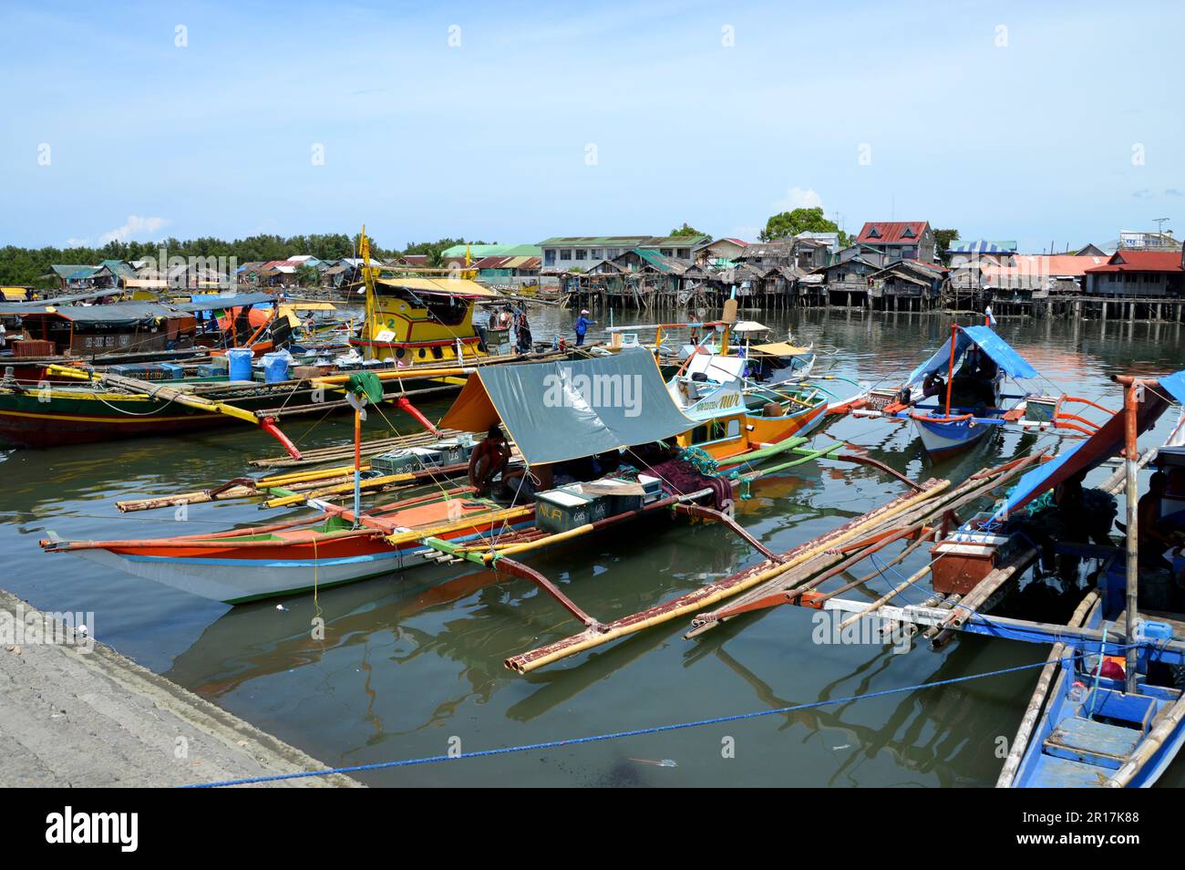 The Philippines, Samar Island, Calbayog: colourful wooden fishing boats ...