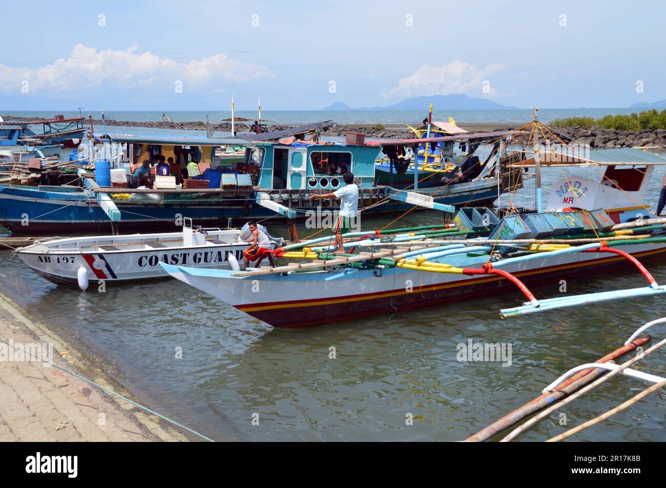 The Philippines, Samar Island, Calbayog: colourful wooden fishing boats ...