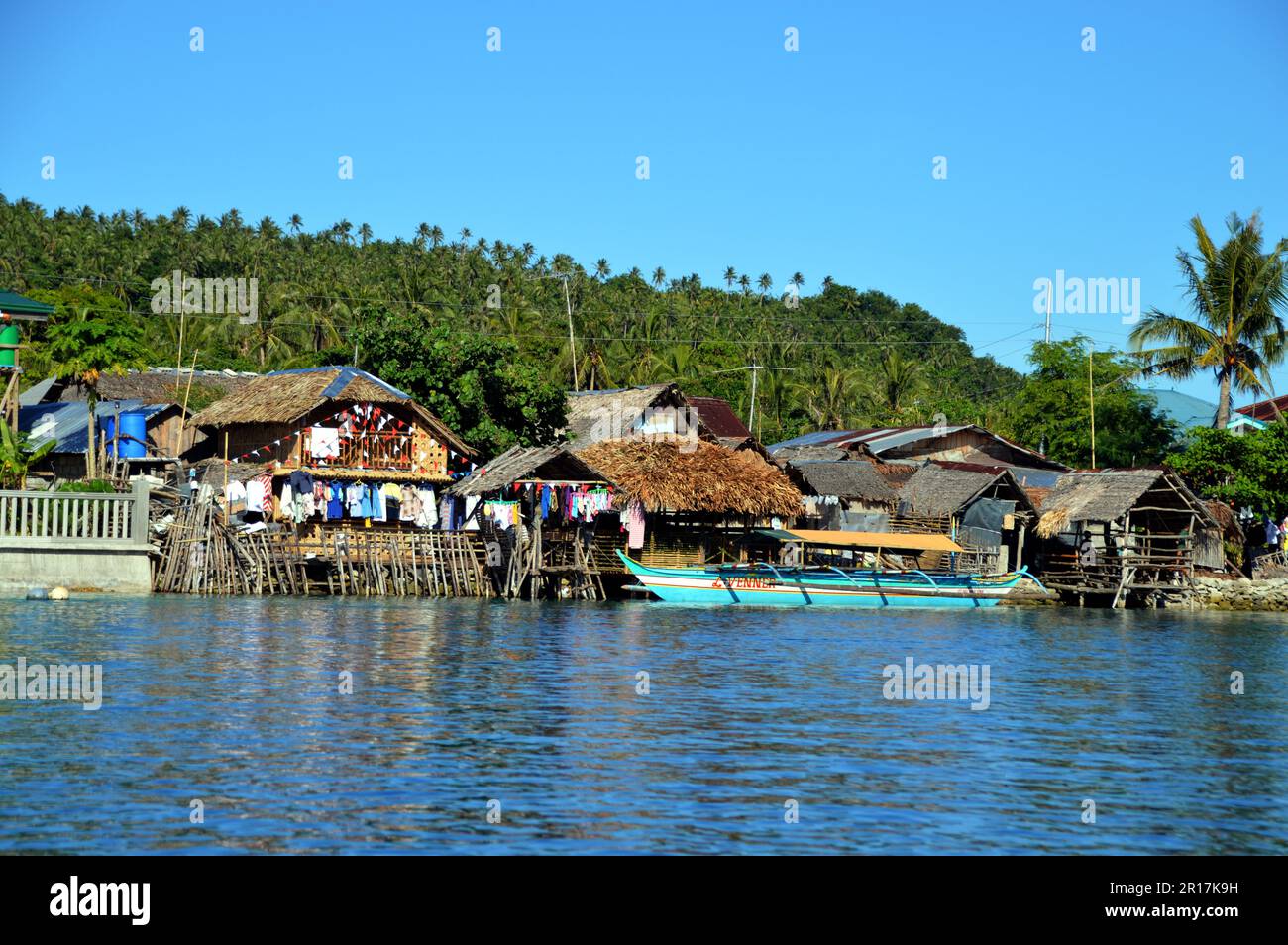The Philippines, Samar Island: thatched wooden dwellings on the shore ...