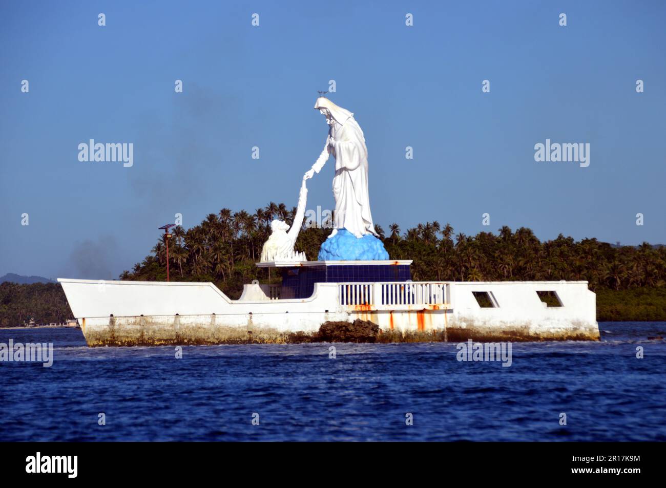 The Philippines, Samar Island: statue of the Virgin Mary (?) in the sea ...