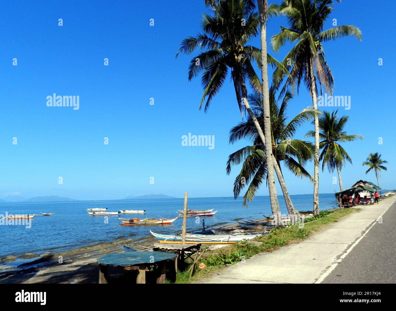 The Philippines, Samar Island, Calbayog: the coast, with fishing boats ...