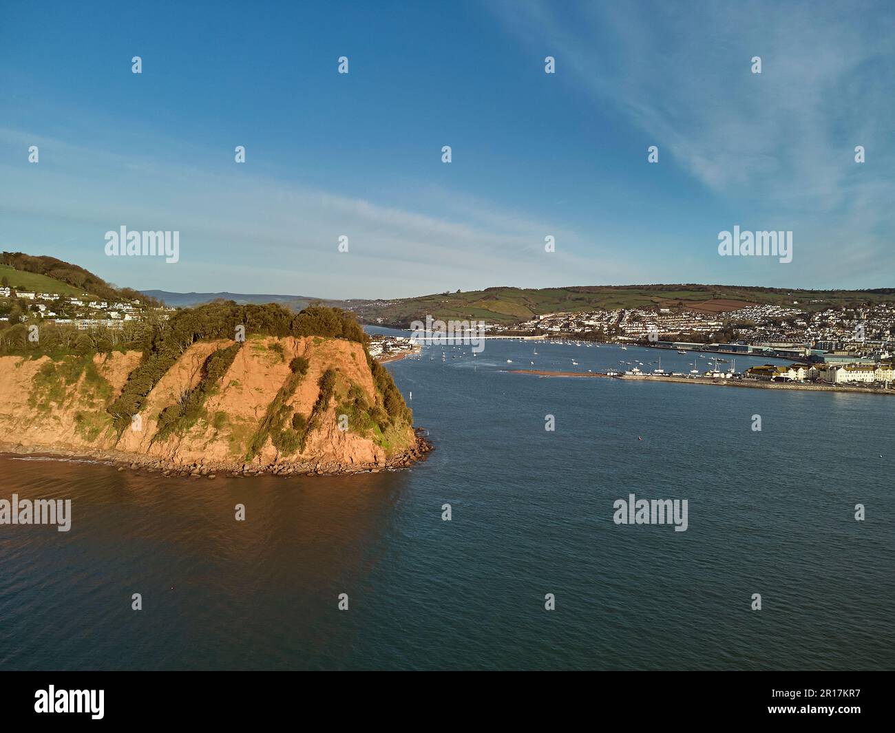 An aerial view of the mouth of the River Teign, with the Ness headland ...