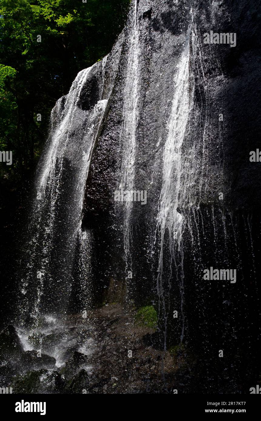 Black rock waterfall Stock Photo - Alamy