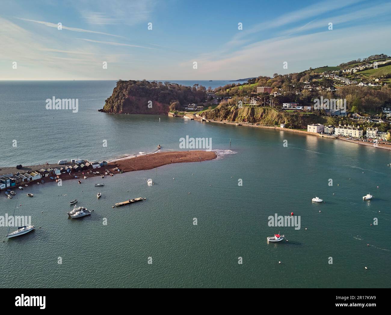 An aerial view of the mouth of the River Teign, with the Ness headland ...