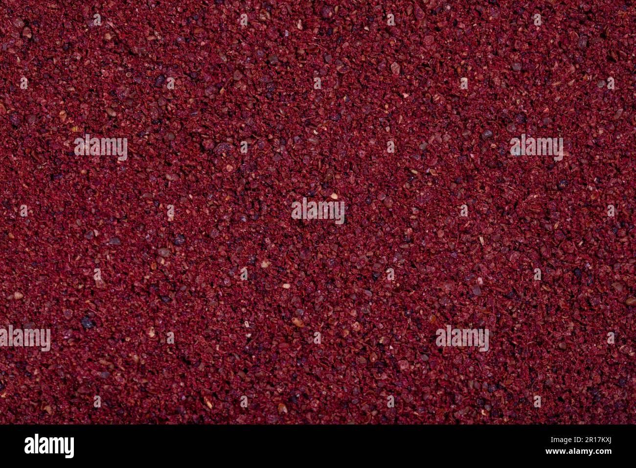 Close-up sumac background. Dried ground red Sumac powder spices. Spices ...
