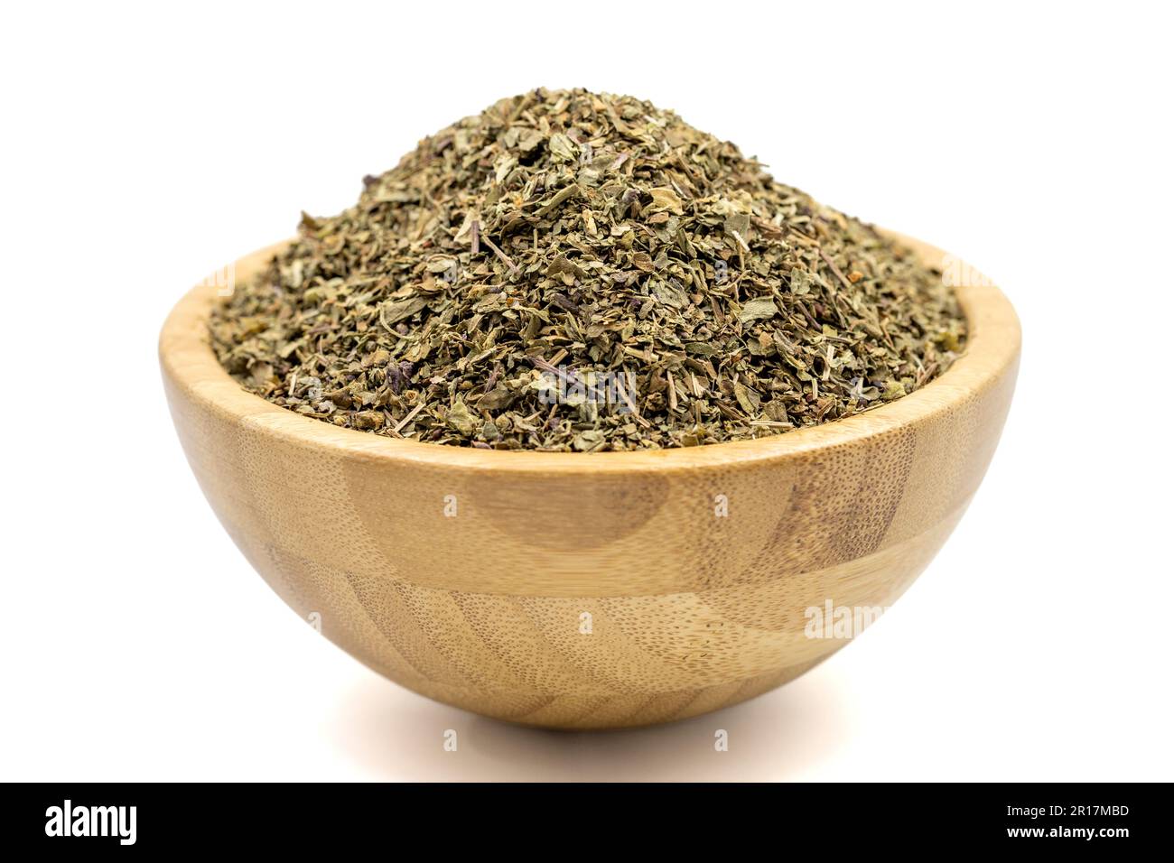 Dried crushed basil isolated on white background. Dried ground basil ...