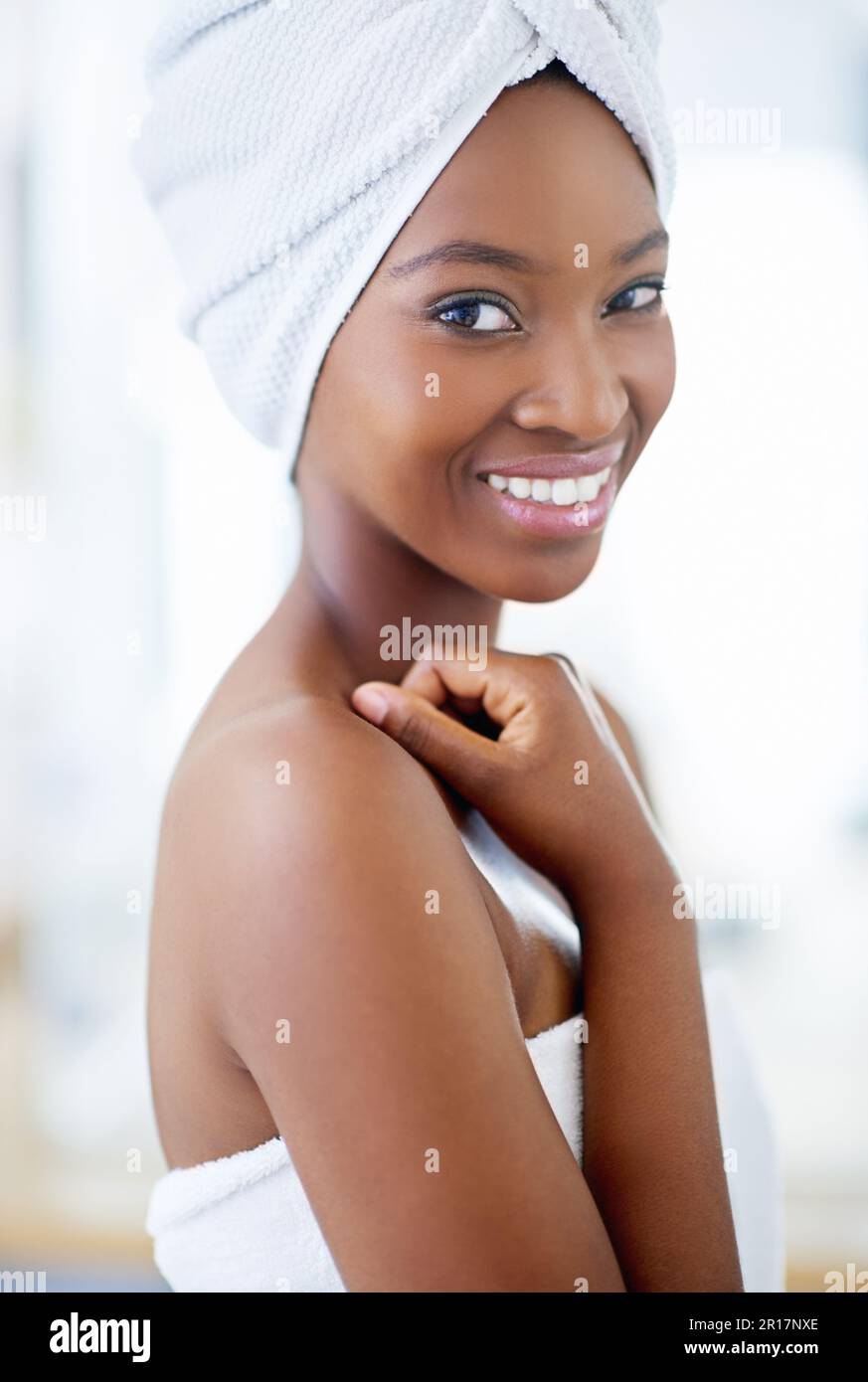 Starting the day out fresh. a beautiful young woman during her daily ...
