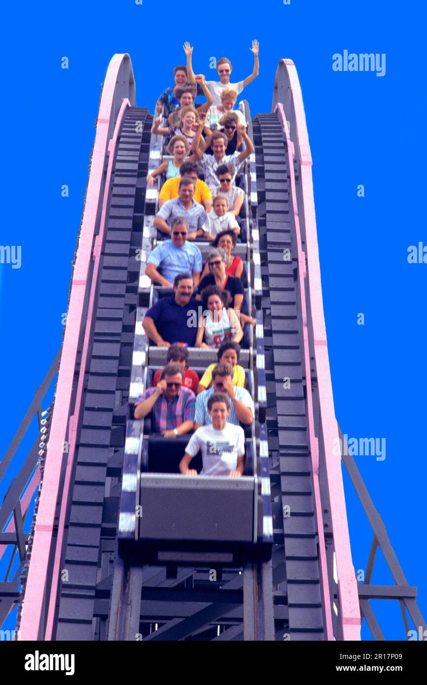 Amusement Park Rollercoaster Ride with Tourists Stock Photo - Alamy