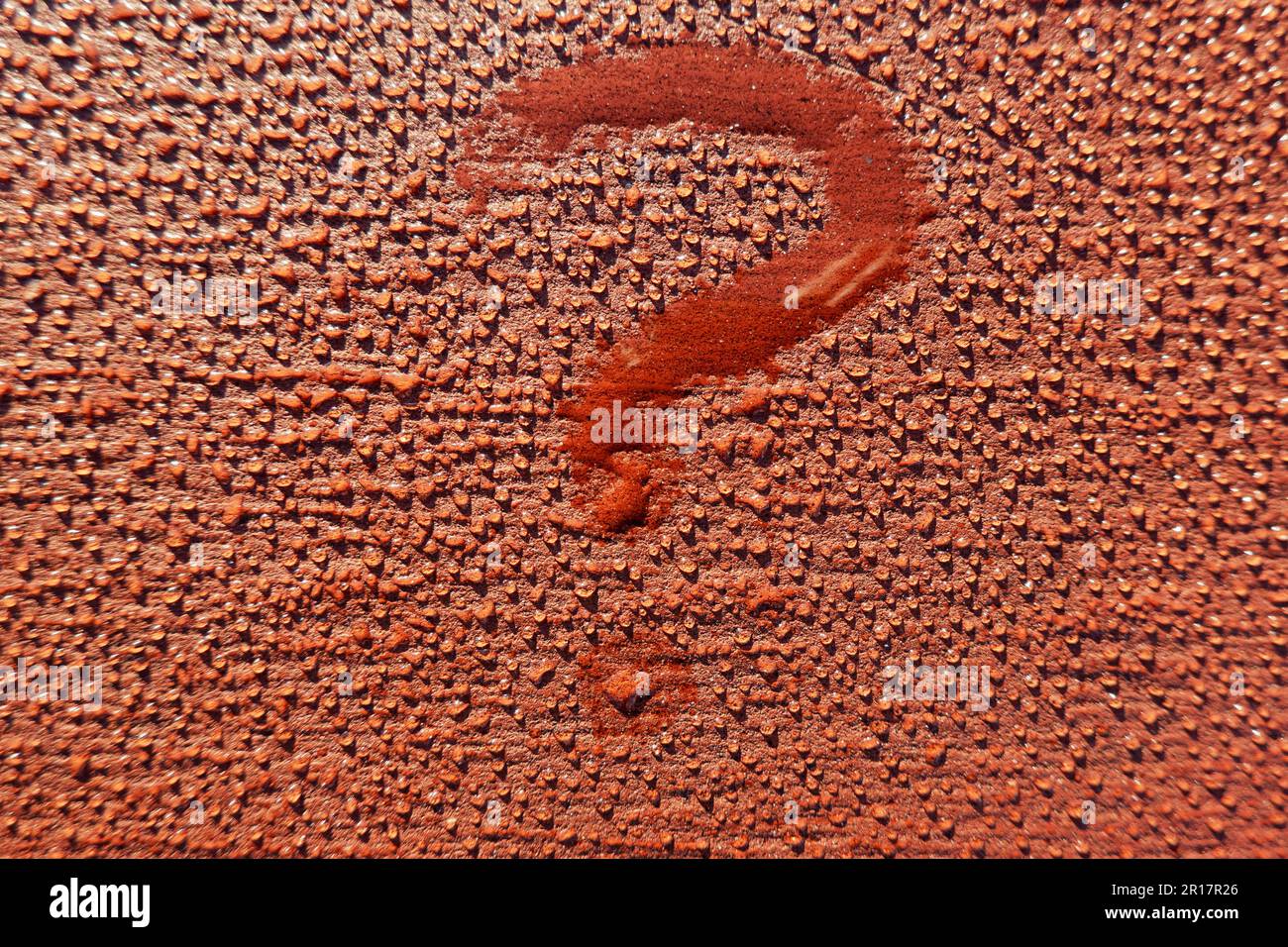 Inscription. Question mark on wet brown wooden background with water ...