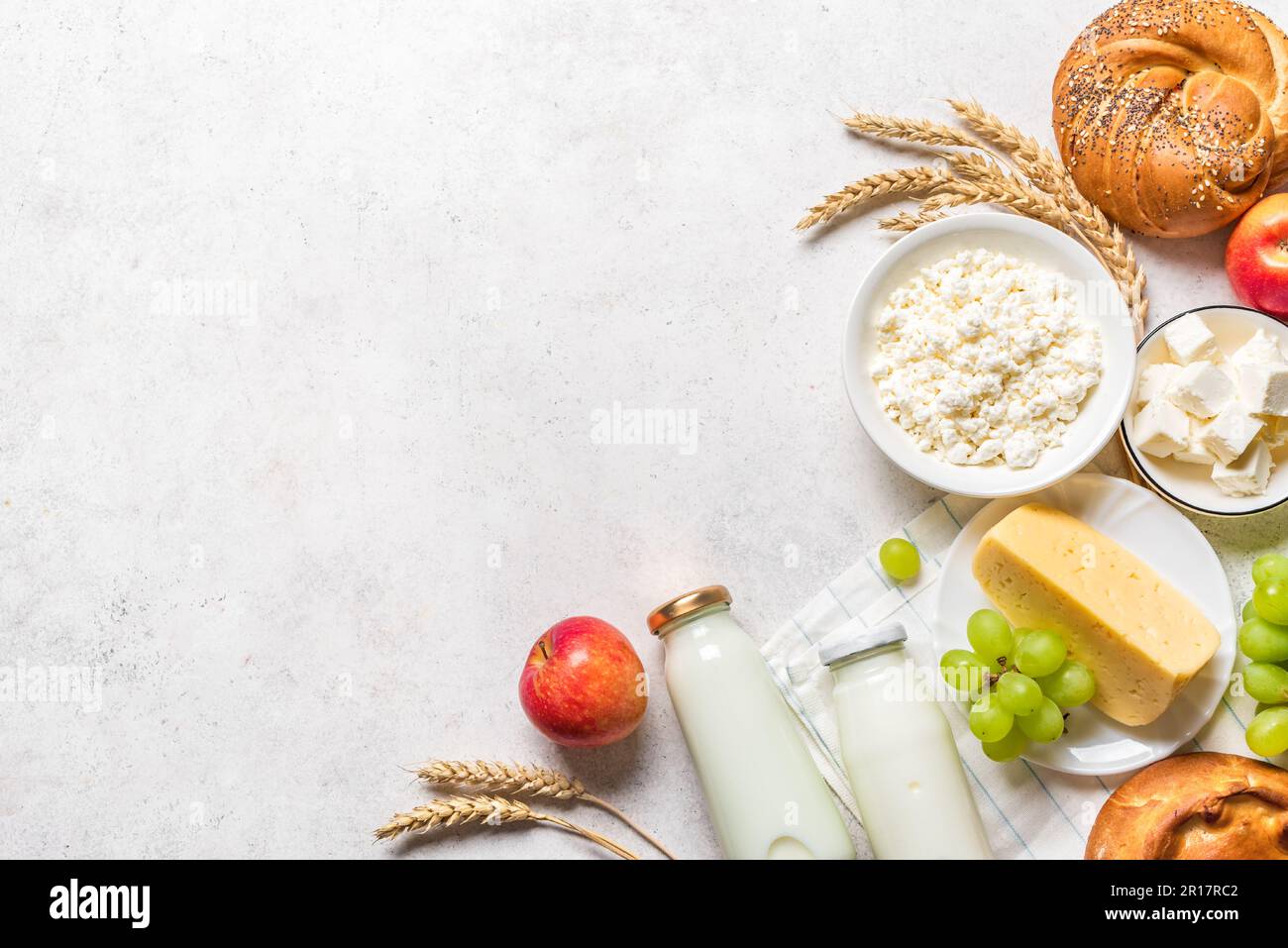 Religious Jewish holiday Shavuot concept with dairy products, cheese ...