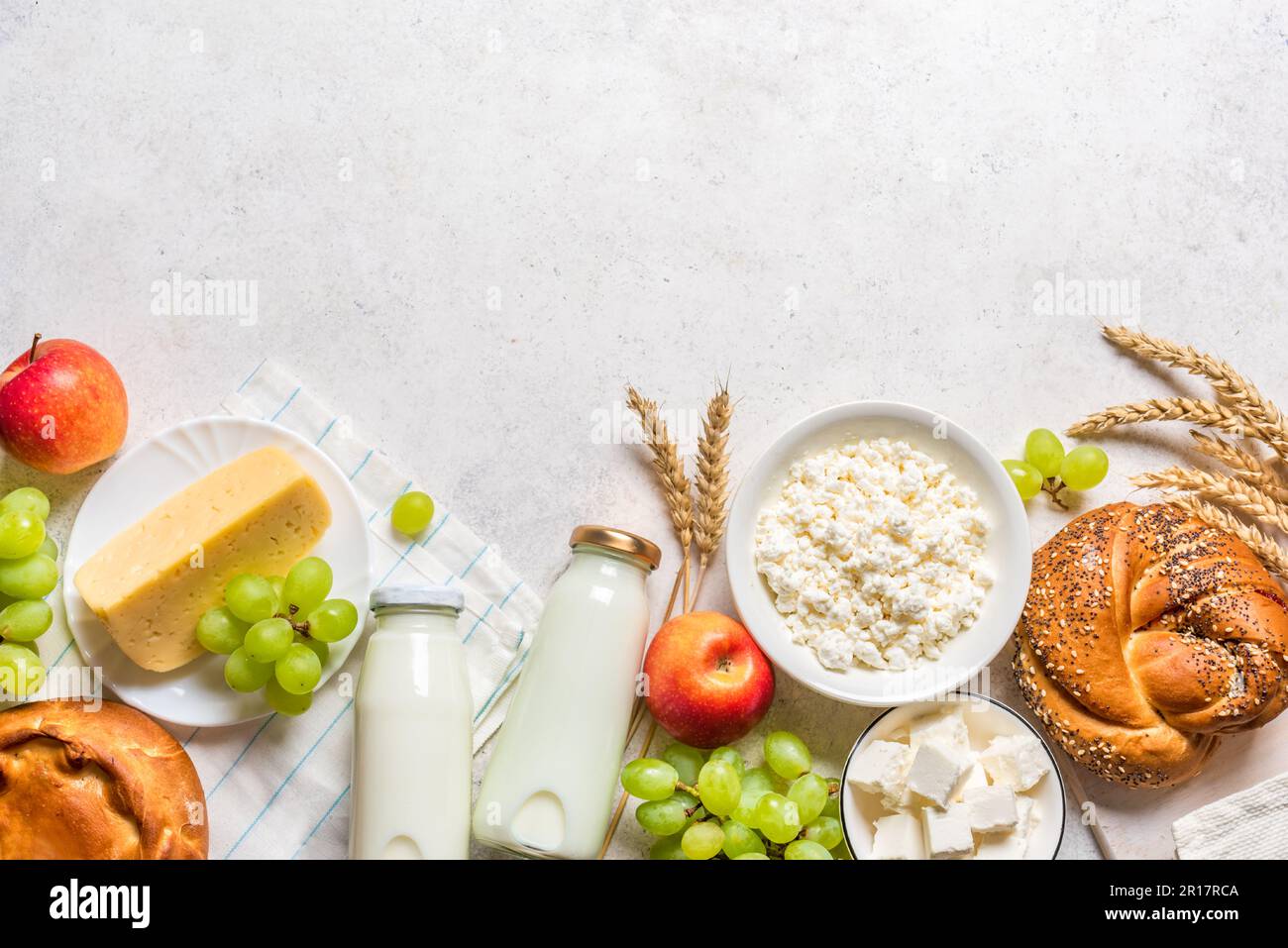 Happy Shavuot - Religious Jewish holiday concept with dairy products ...