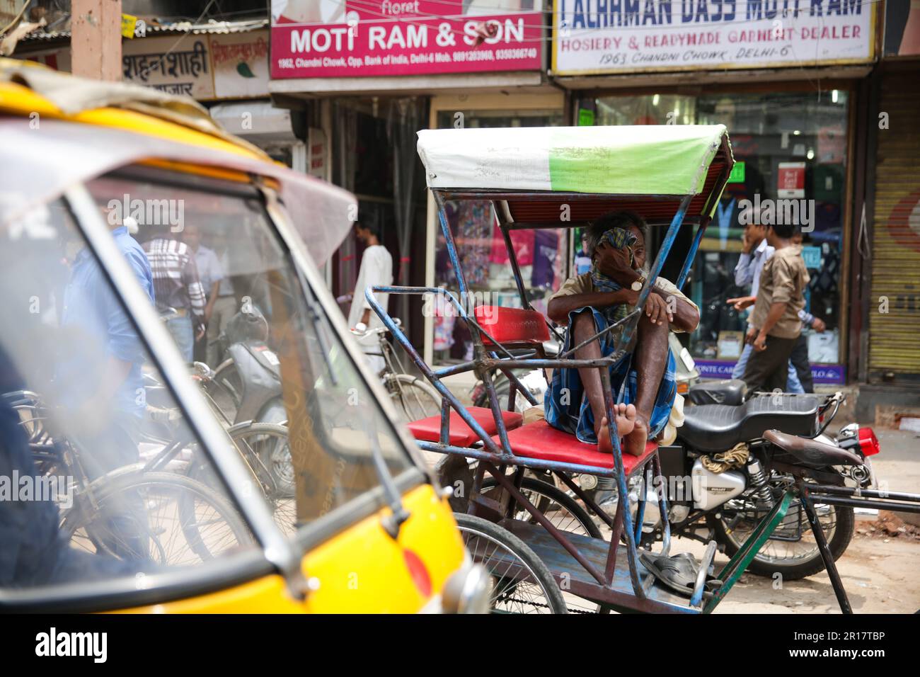 Indian man on rickshaw hi-res stock photography and images - Alamy