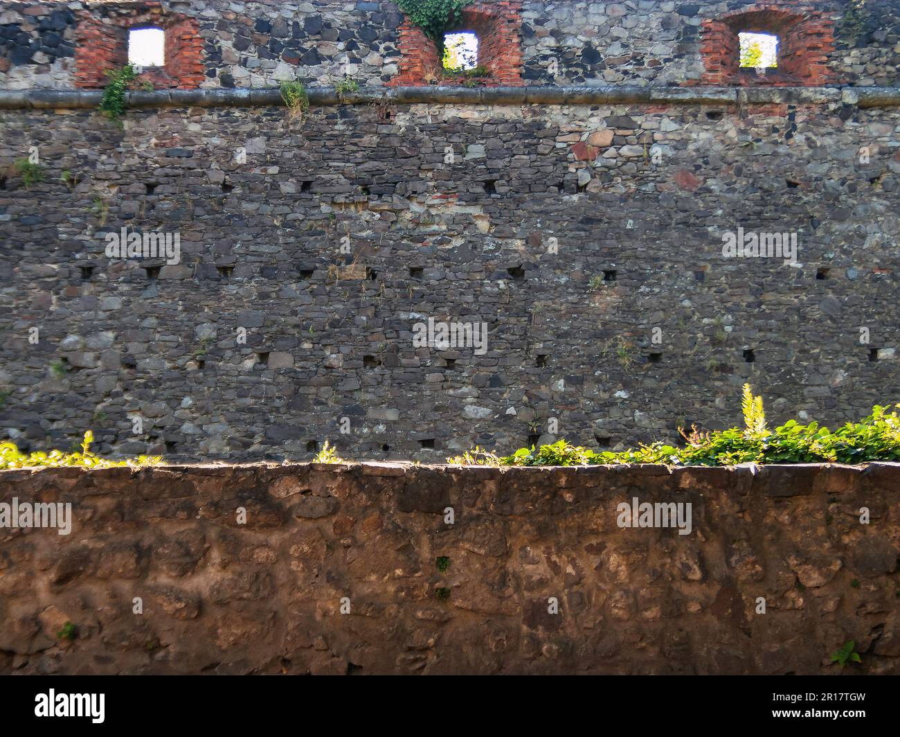 medieval stone wall. vintage architectural background Stock Photo - Alamy