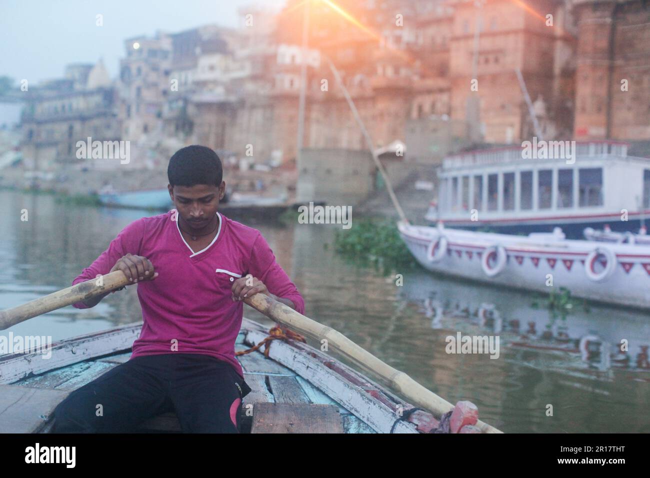 Indian Man in Row Boat on the River Ganges in Varanasi India Stock ...