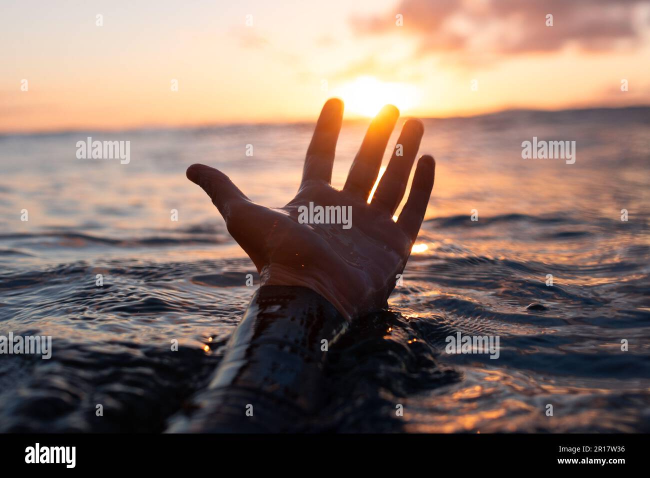 Hand ocean hi-res stock photography and images - Alamy