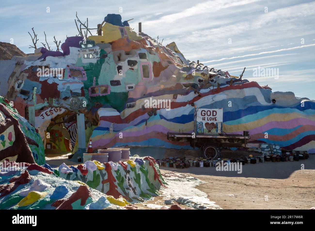 Salvation Mountain with God is love sign Stock Photo - Alamy
