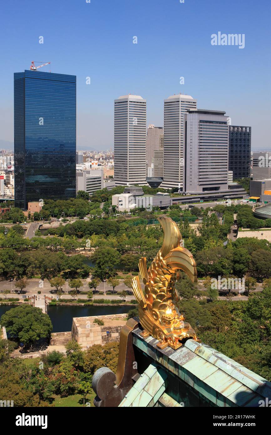 Golden dolphins surmounting the tower of Osaka Castle and Osaka's ...