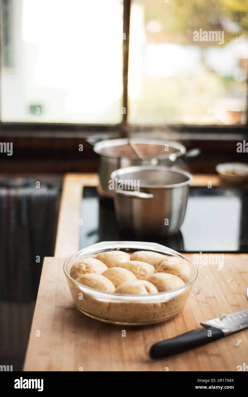 Fresh baked bread sits read to go in oven at homely kitchen Stock Photo ...