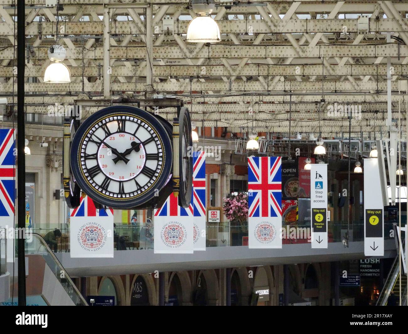 Clock and flags, Union Jacks, at Waterloo railway station, London ...
