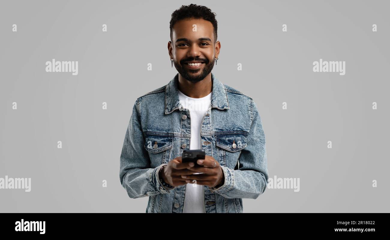 Portrait of handsome excited cheerful joyful delightful guy wearing ...