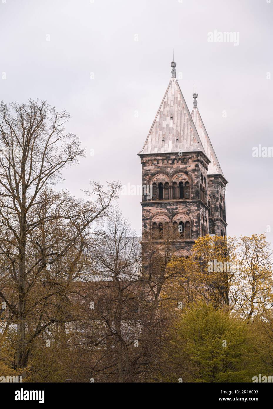 Autumn colored trees in front of Lund cathedral towers Stock Photo - Alamy