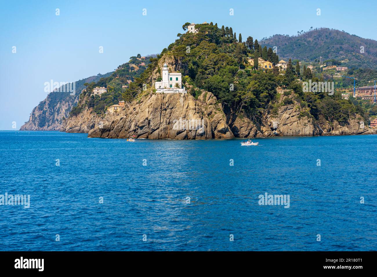 Headland and white lighthouse of Portofino village, Genoa province ...