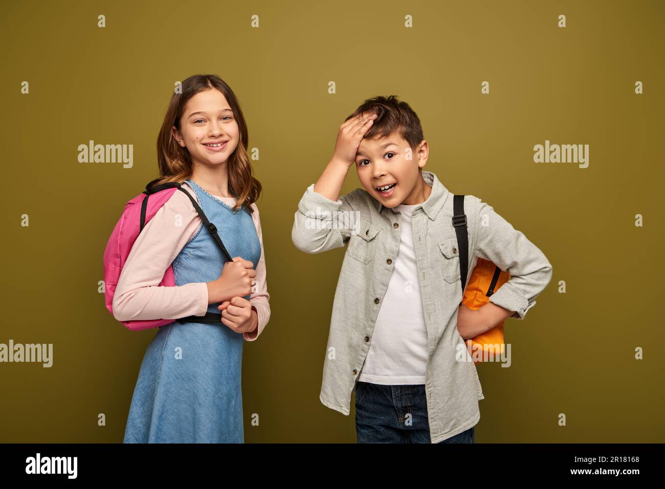 Boy touching head hi-res stock photography and images - Alamy